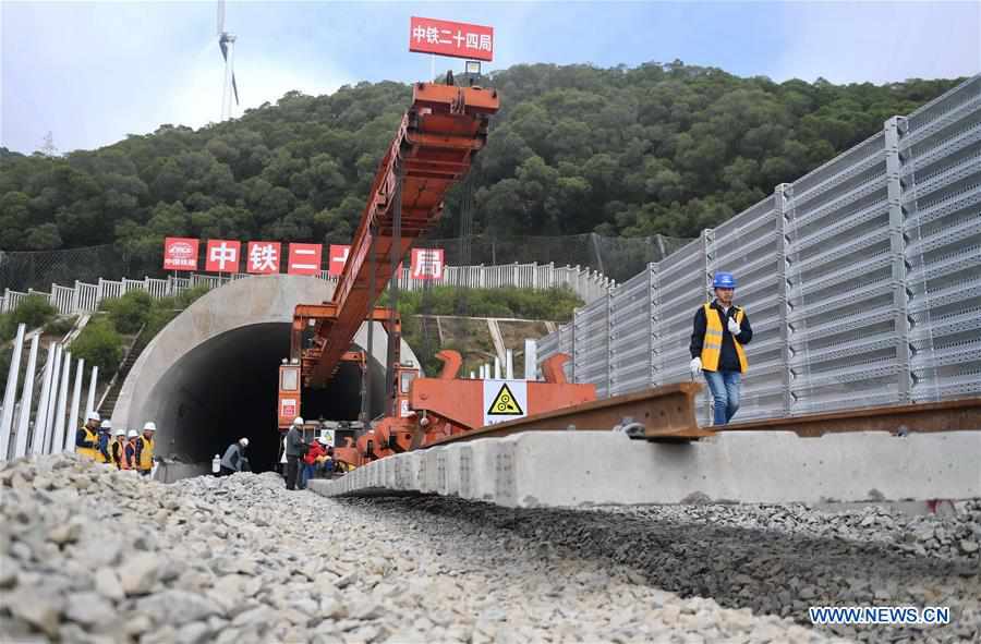 Tracklaying work for road-rail bridge starts in southeast China's ...