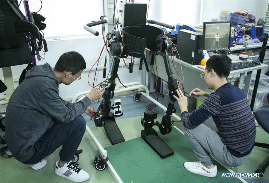 Pic story: exoskeleton robot brings hope to paralyzed people, the aged ...