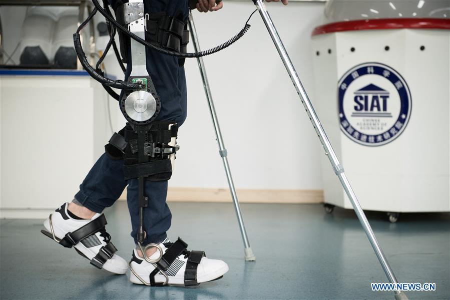 Pic story: exoskeleton robot brings hope to paralyzed people, the aged ...